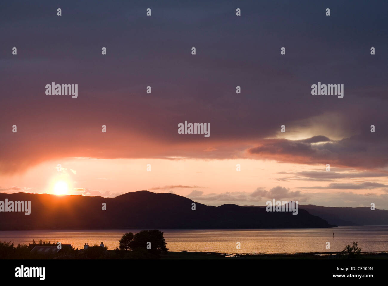 Sunset over Scalpay and Raasay in the distance from Breakish Broadford ...