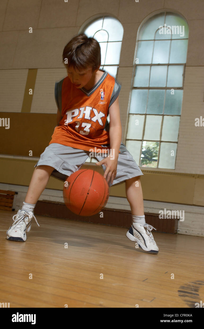 Boy Playing Basketball Stock Photo - Alamy