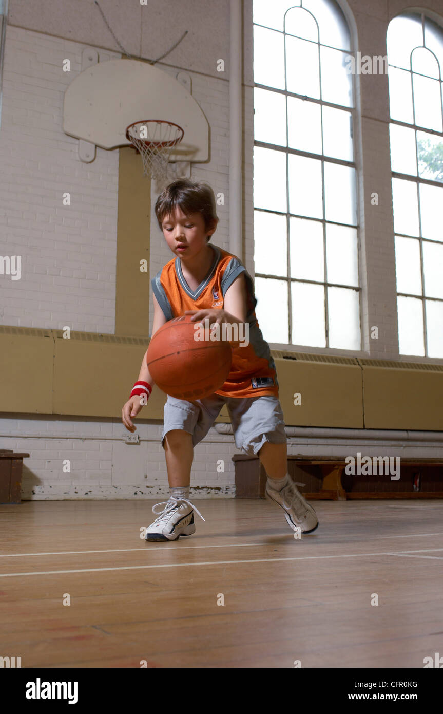 Boy Playing Basketball Stock Photo - Alamy