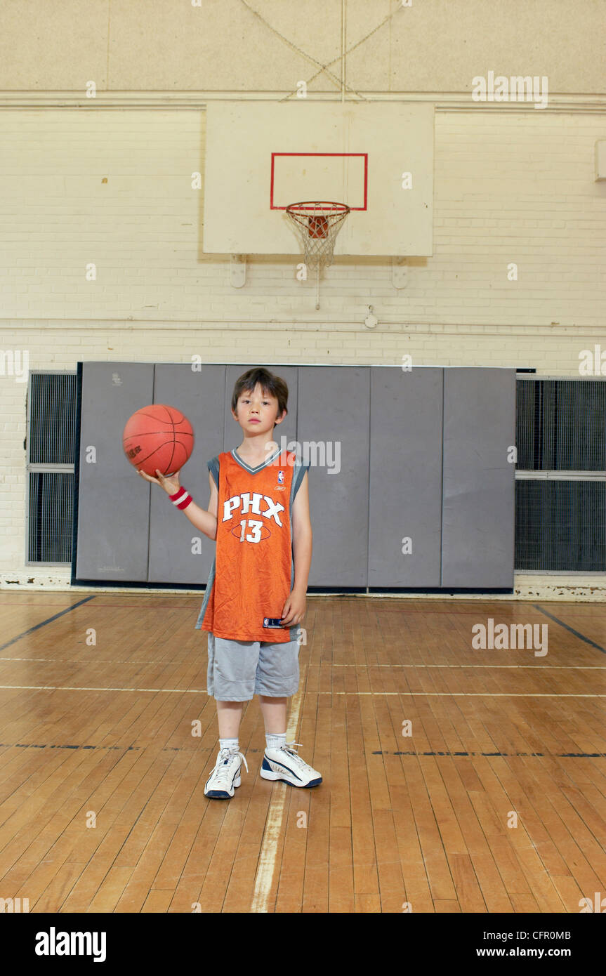 Boy with Basketball Stock Photo - Alamy