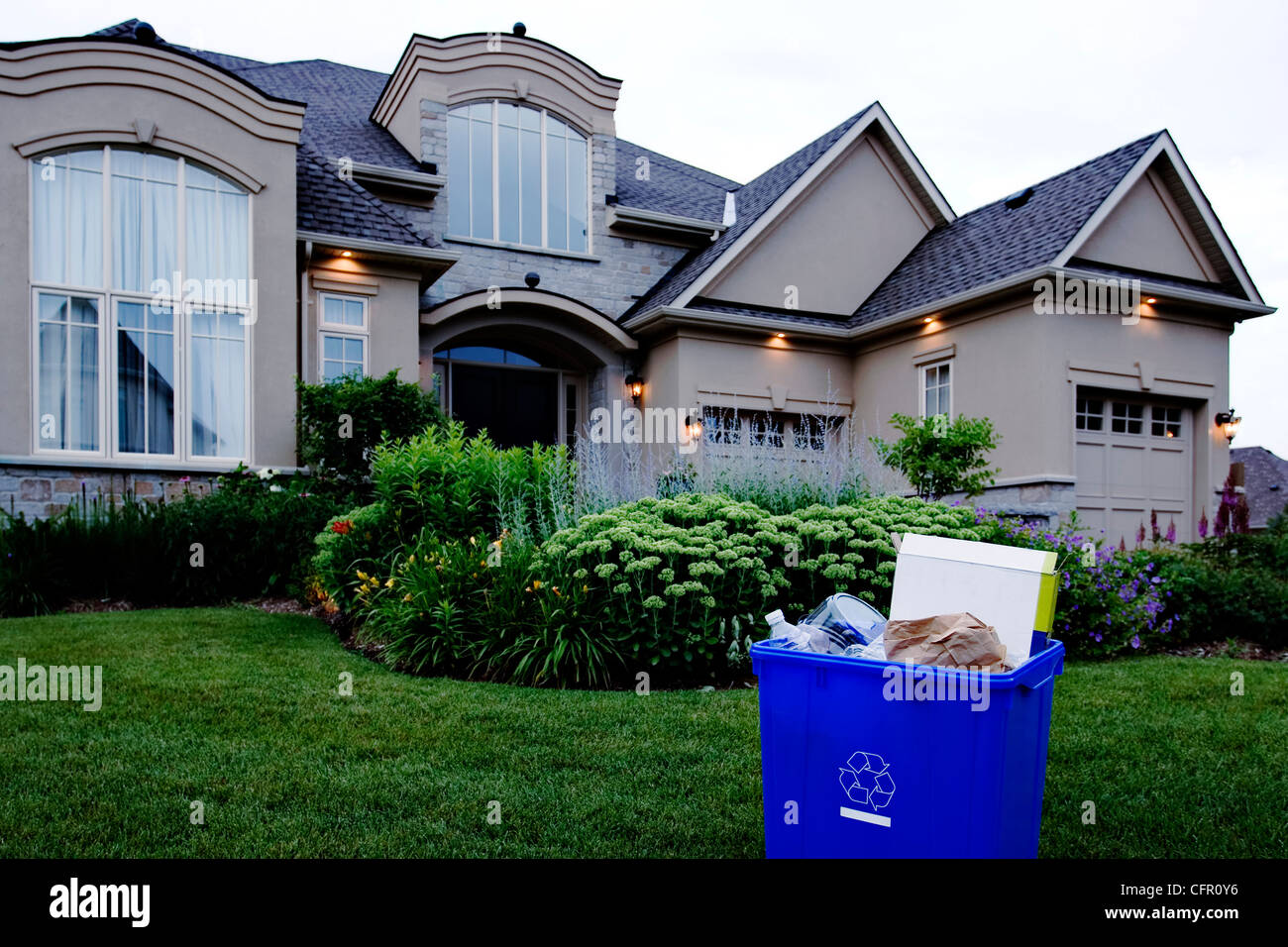 Recycling Bin on Front Lawn Stock Photo - Alamy