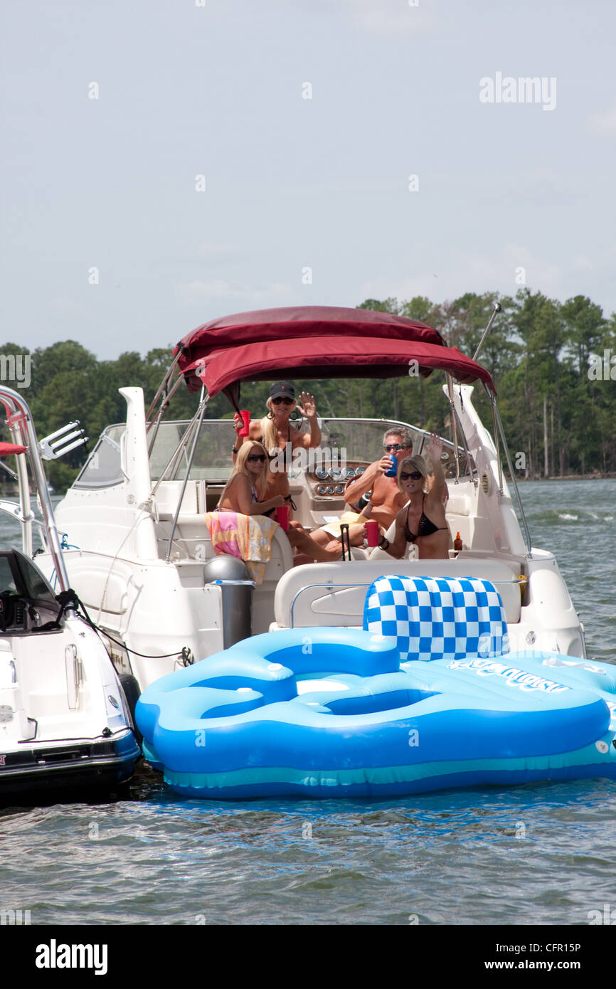 Rock the dock summer lake party Stock Photo - Alamy