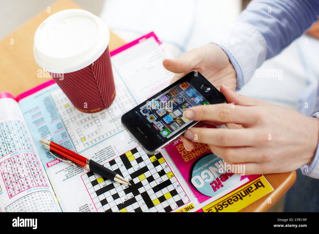 Woman using iPhone Stock Photo - Alamy
