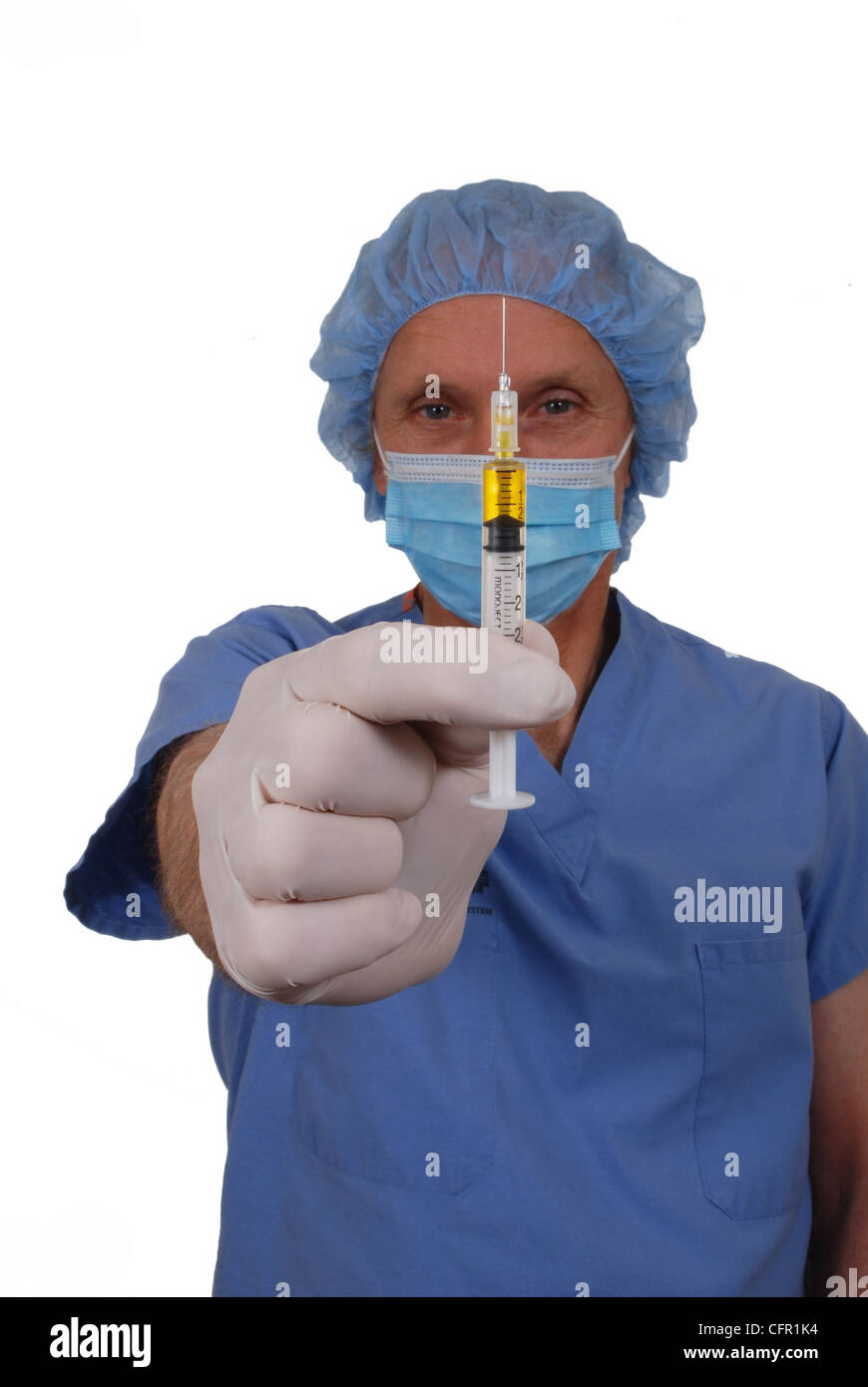 Male surgeon holding a syringe out. Isolated on white Stock Photo - Alamy