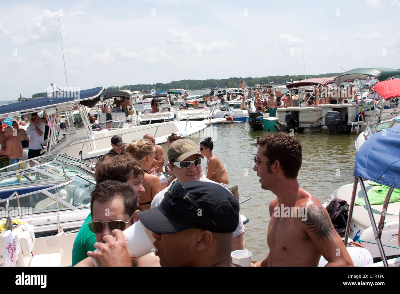 Rock the dock summer lake party Stock Photo - Alamy