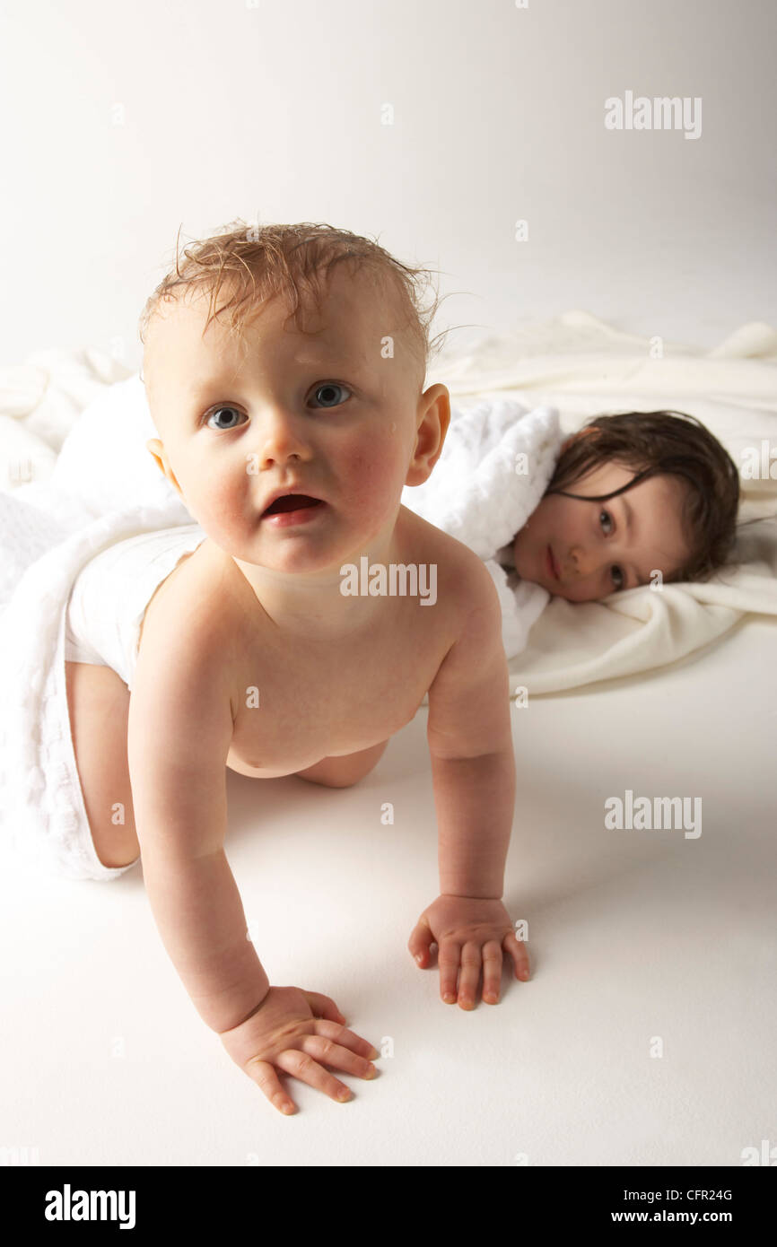 Girl and Baby Brother after a Bath Stock Photo - Alamy