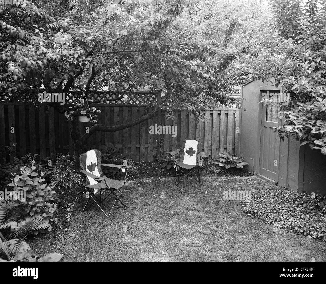 Backyard lawn chair Black and White Stock Photos & Images - Alamy