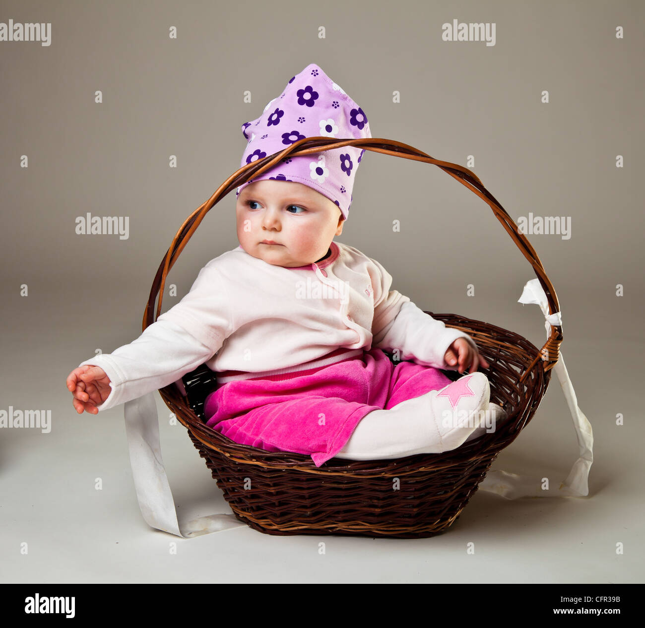 Infant girl in studio Stock Photo - Alamy