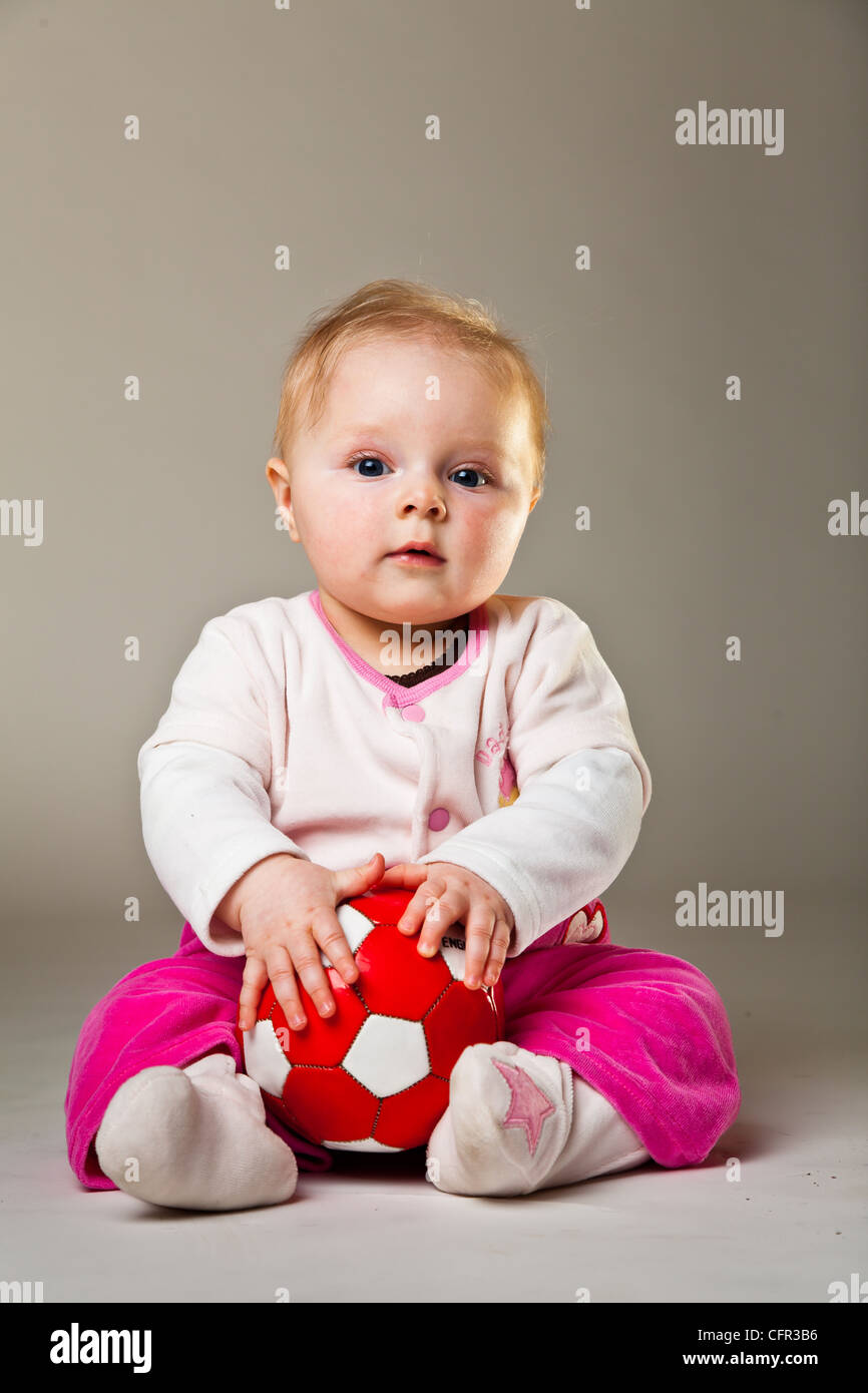 Infant girl in studio Stock Photo - Alamy