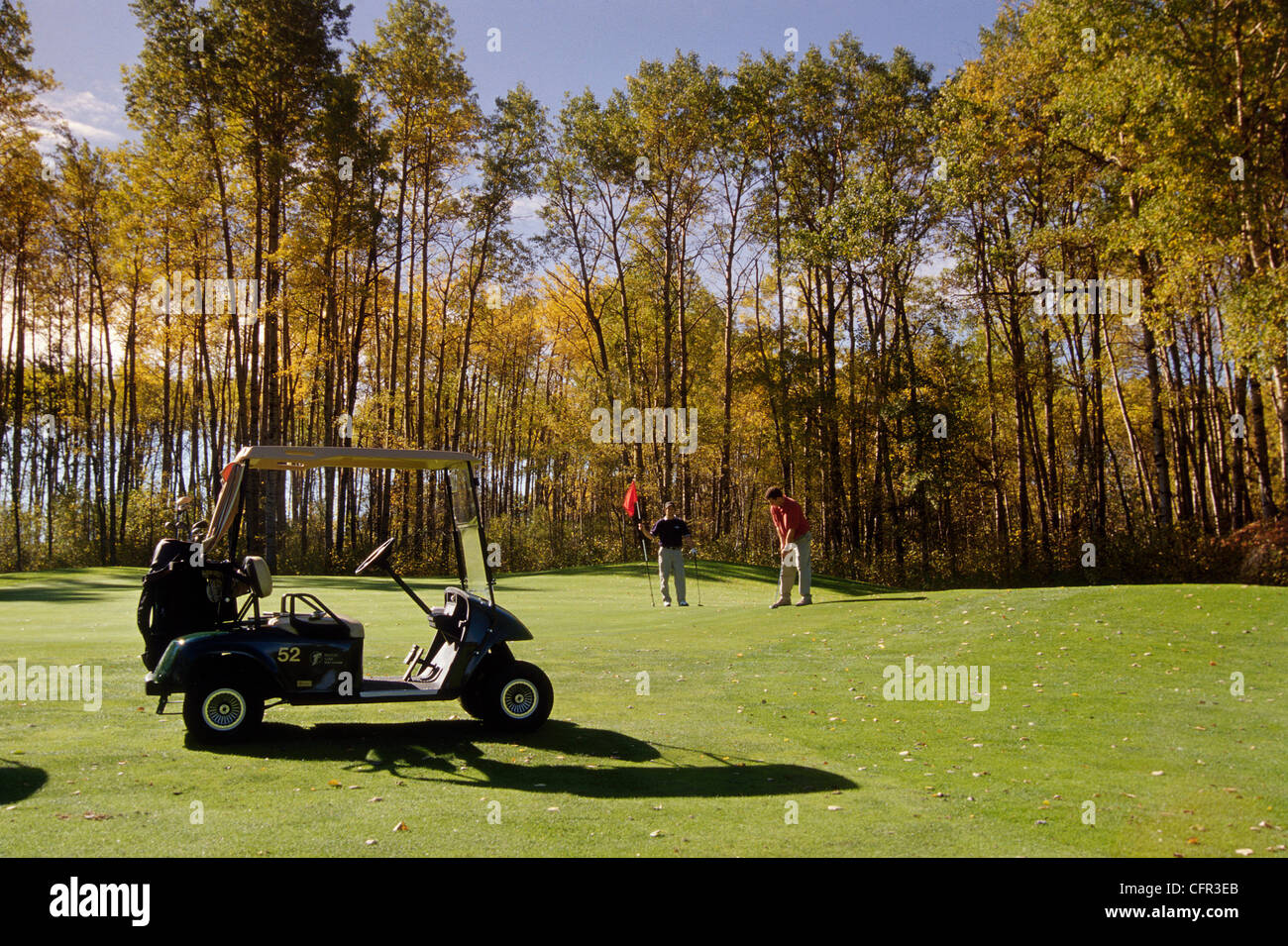 Golfers, Falcon Lake, Whiteshell Provincial Park, Manitoba Stock Photo ...