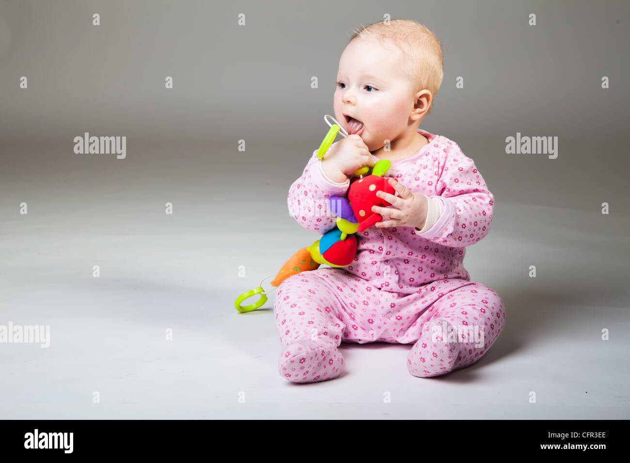Infant girl in studio Stock Photo - Alamy