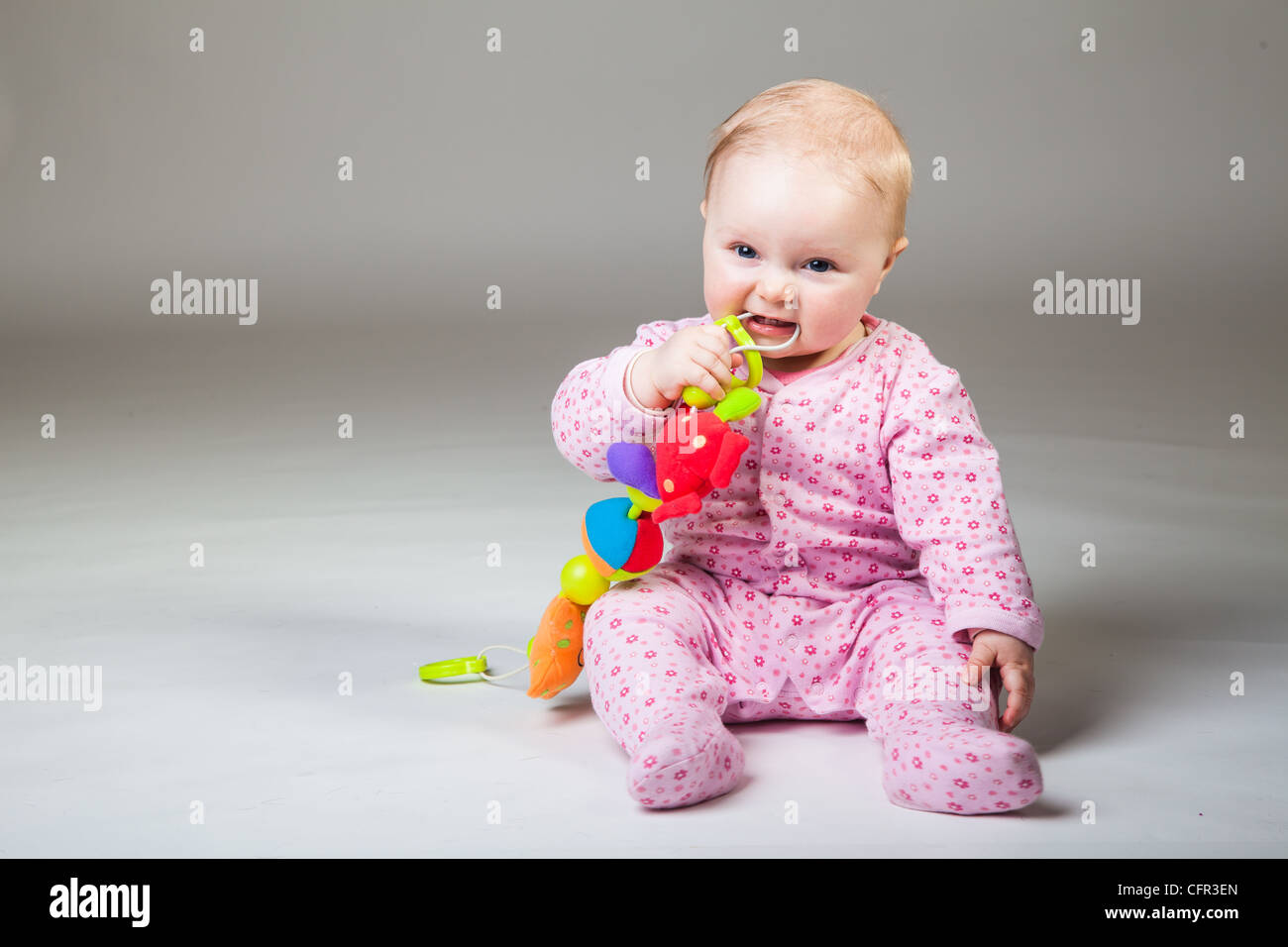 Infant girl in studio Stock Photo - Alamy