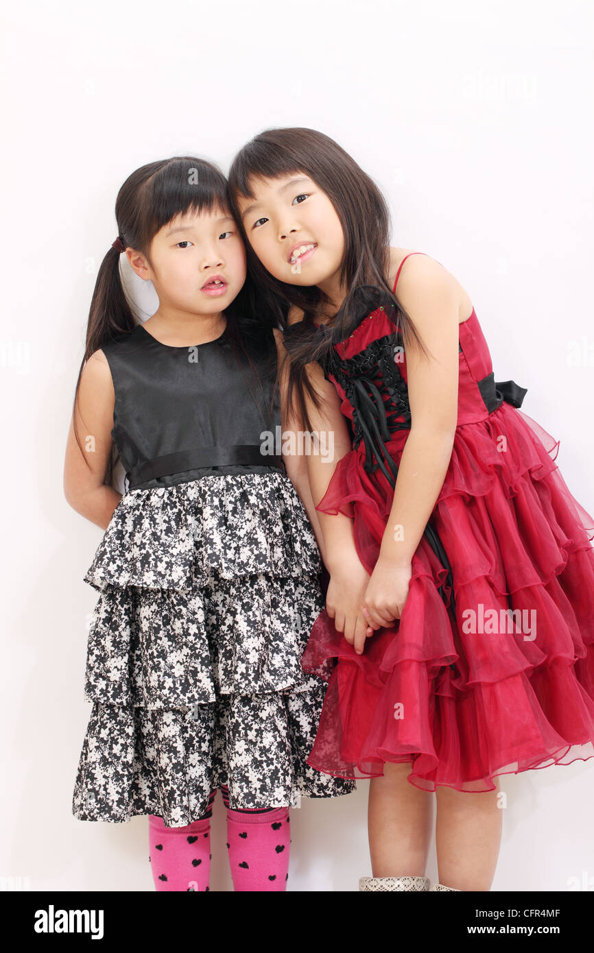 Two girls white dress hi-res stock photography and images - Alamy