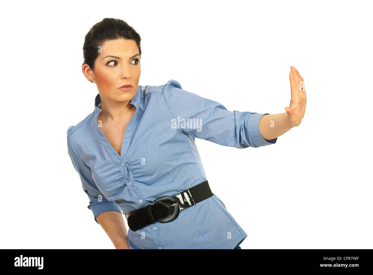 Scared amazed executive woman stop hand to right side of image isolated ...