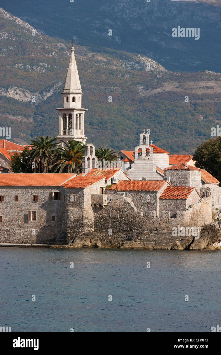 Budva fortified old town on the Adriatic coast with the tower of St ...
