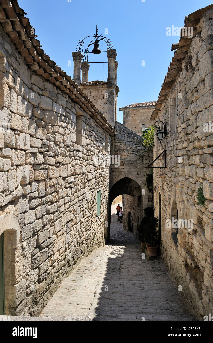 Cobbled alley and bell tower in the picturesque medieval village of ...