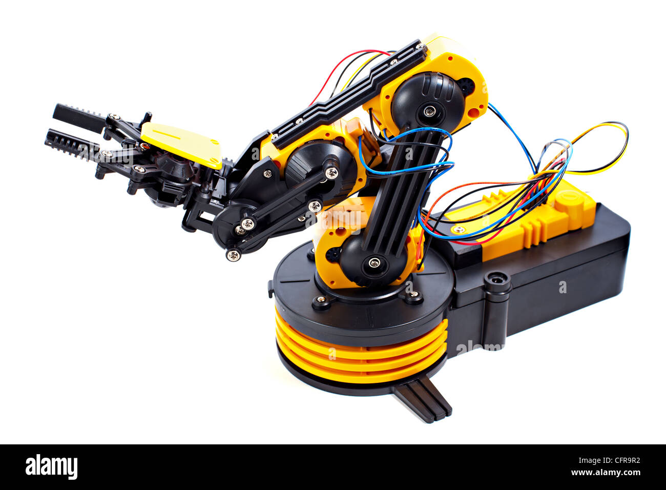 Black and yellow electronic robotic arm Stock Photo - Alamy