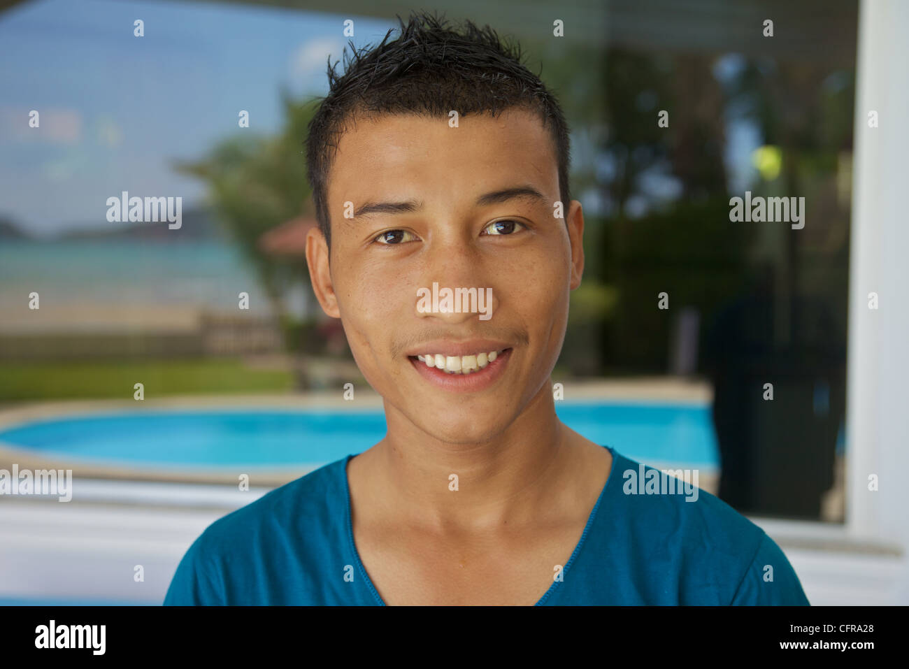 A young smiling Thai guy looking at camera, Phuket Thailand Stock Photo ...