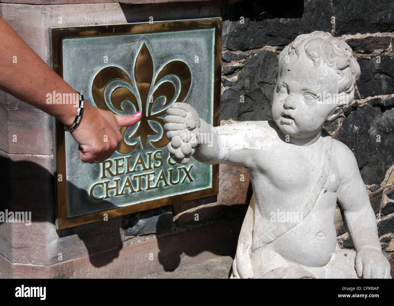 A thumbs up to the cherub at Relais & Chateaux Hotel of Sharrow Bay ...