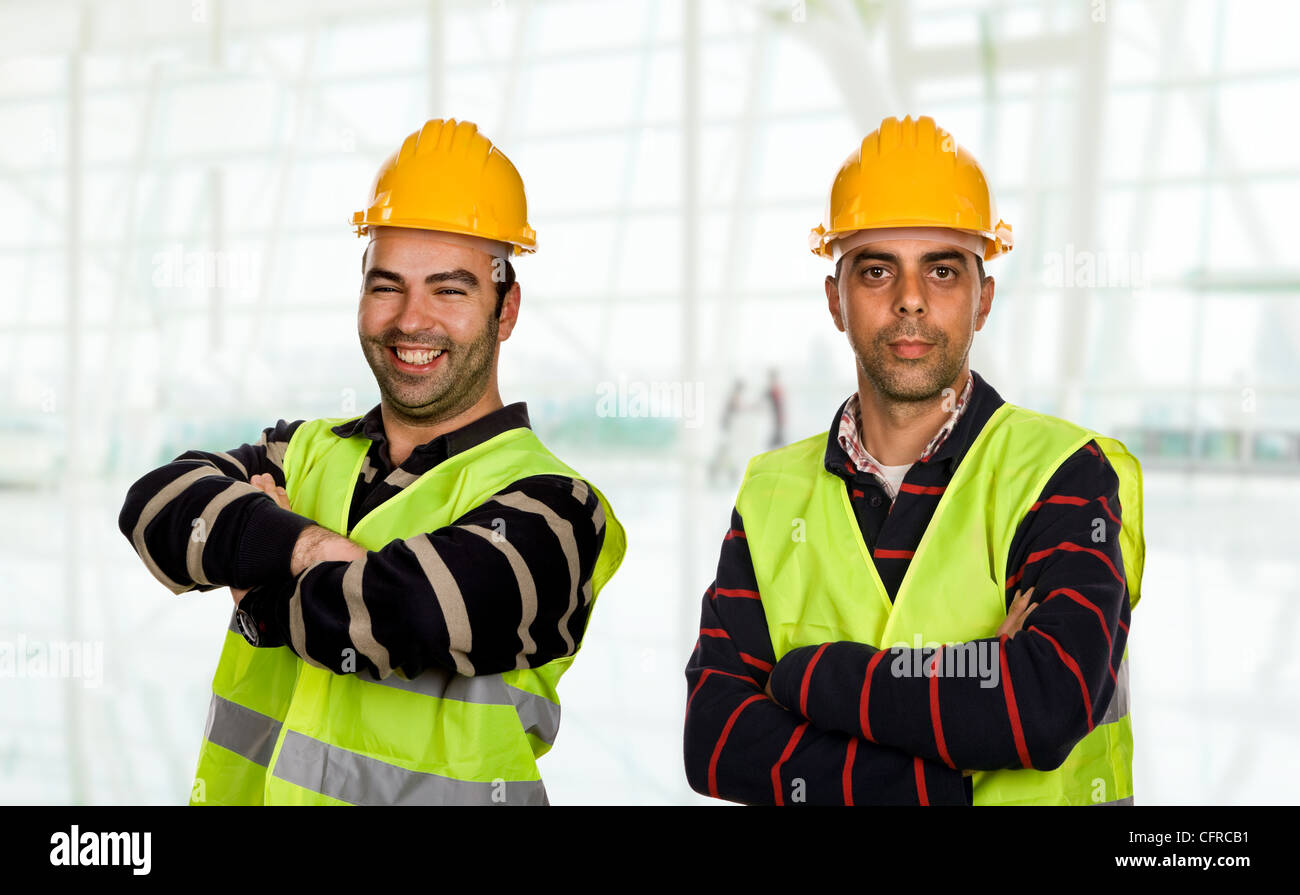 two young workers standing Stock Photo - Alamy