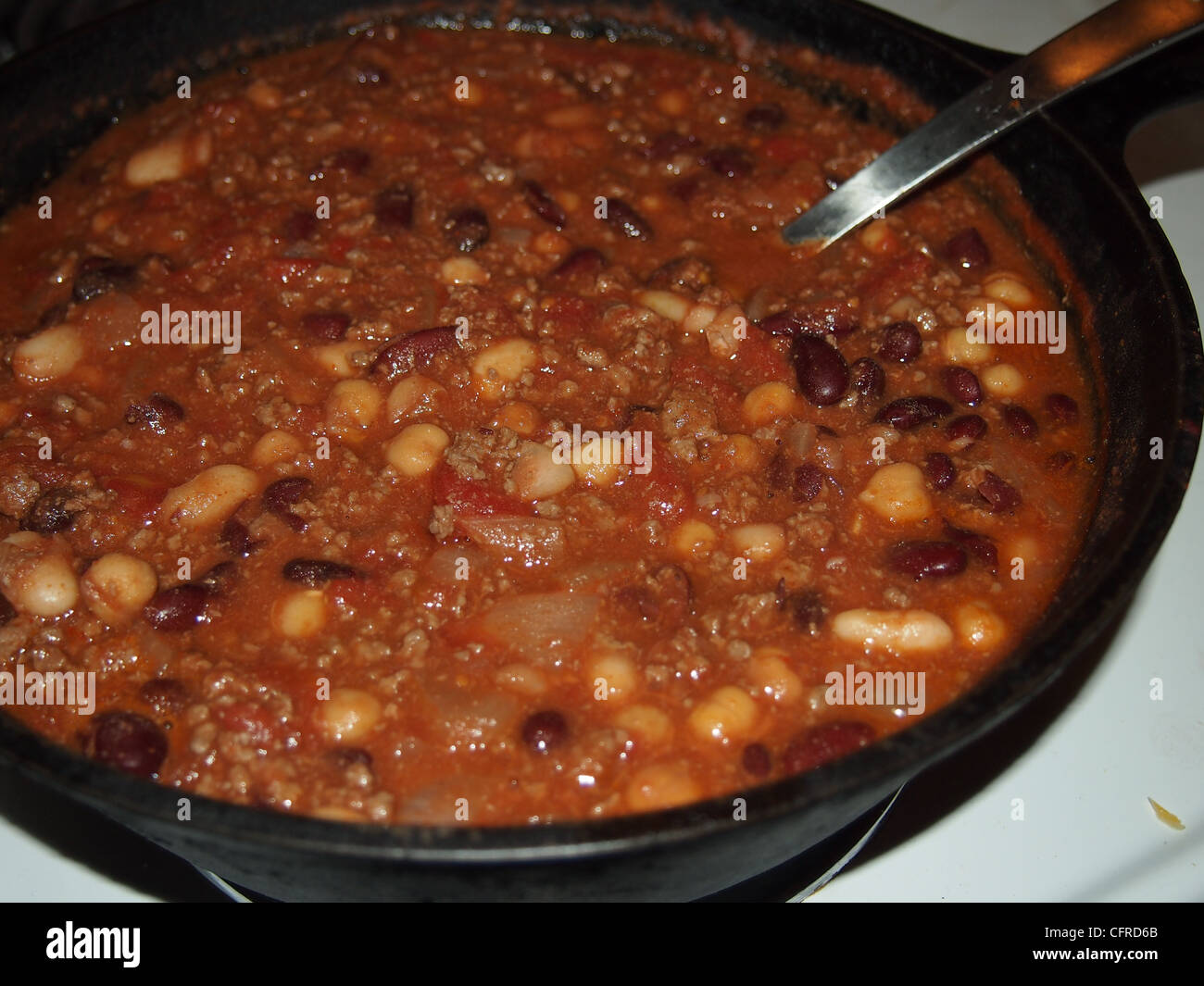 Chili Con Carne in a cast iron pan Stock Photo - Alamy