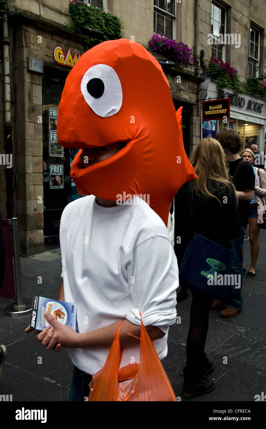 Man with a goldfish head promoting a Fringe Festival show in the Royal ...