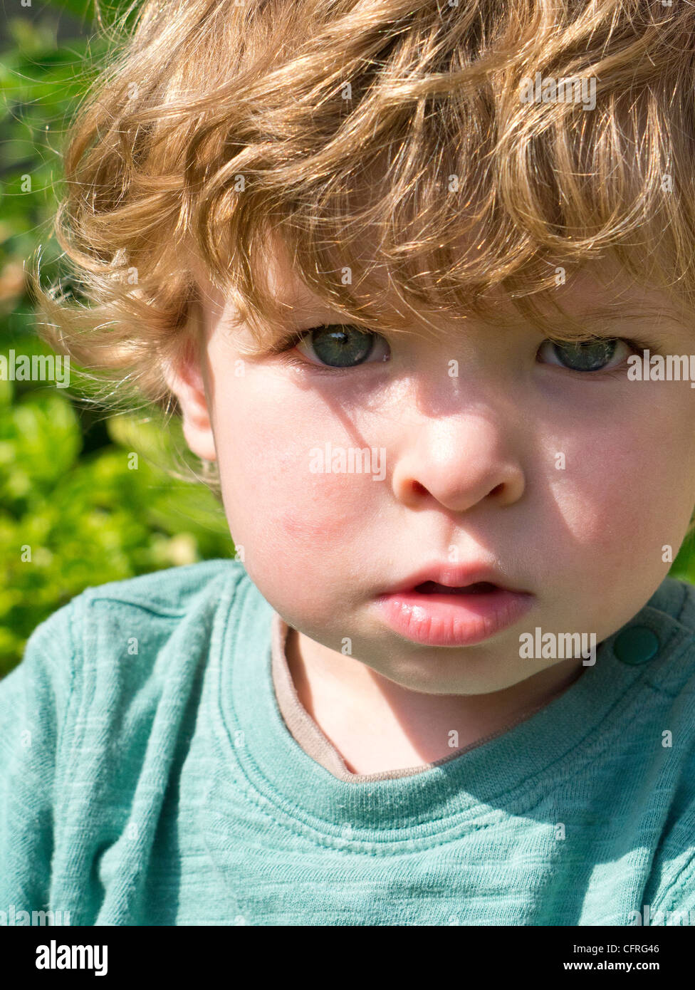 Outdoor Portrait of 18 Month Boy with Tousled Blond Hair Stock Photo ...