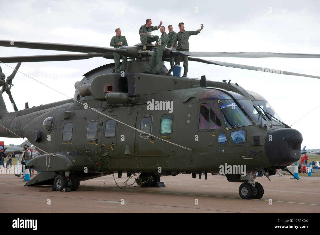 Airmen watching an air show display from the top of a helicopter Stock ...