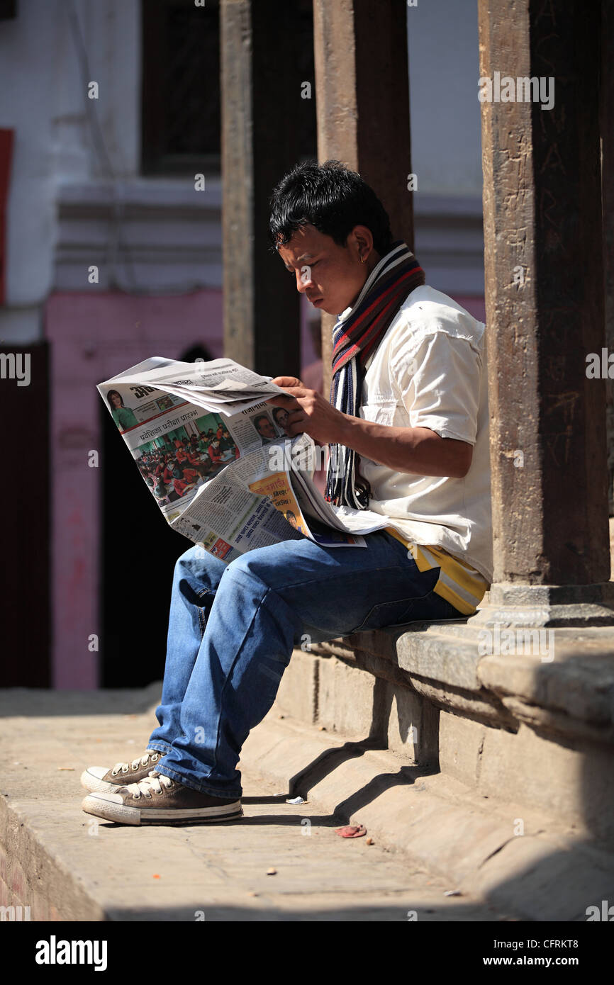 Nepali man reading the news Kathmandu Nepal Stock Photo - Alamy