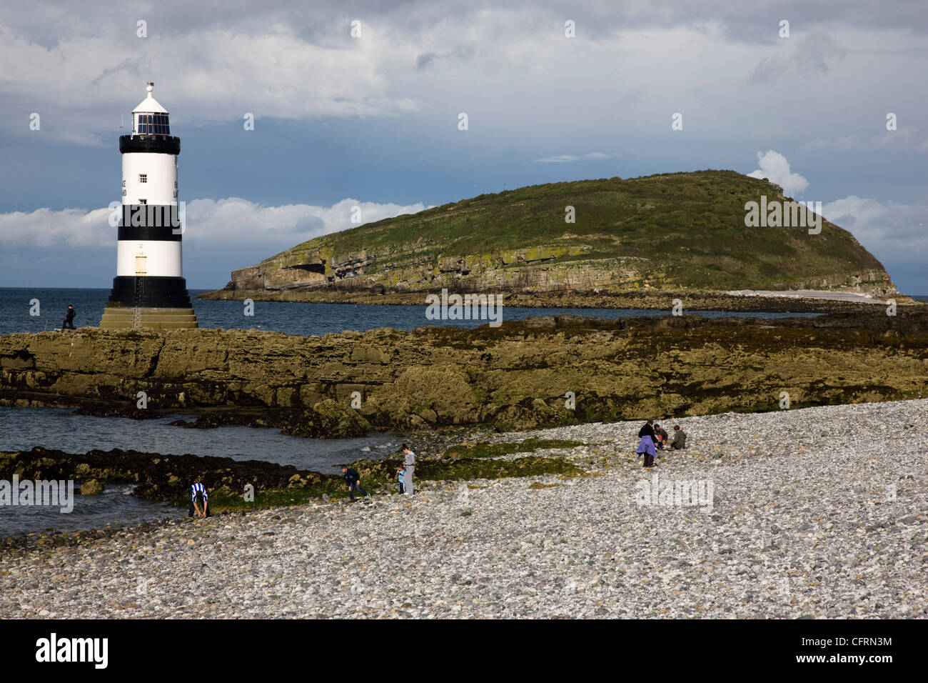 Penmon Point lighthouse and Puffin Island in Anglesey, North Wales ...