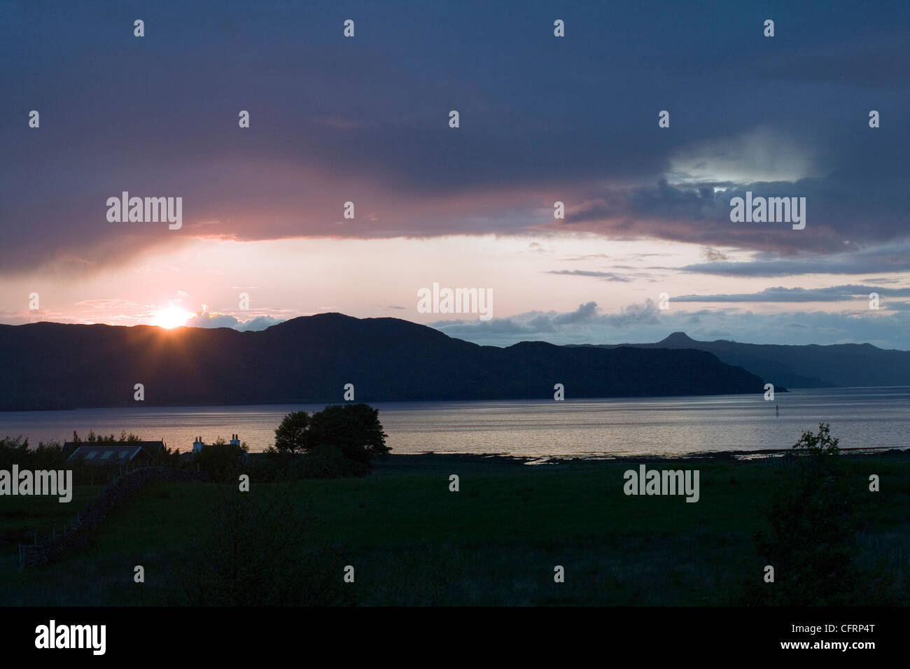 Sunset over Scalpay and Raasay in the distance from Breakish Broadford ...