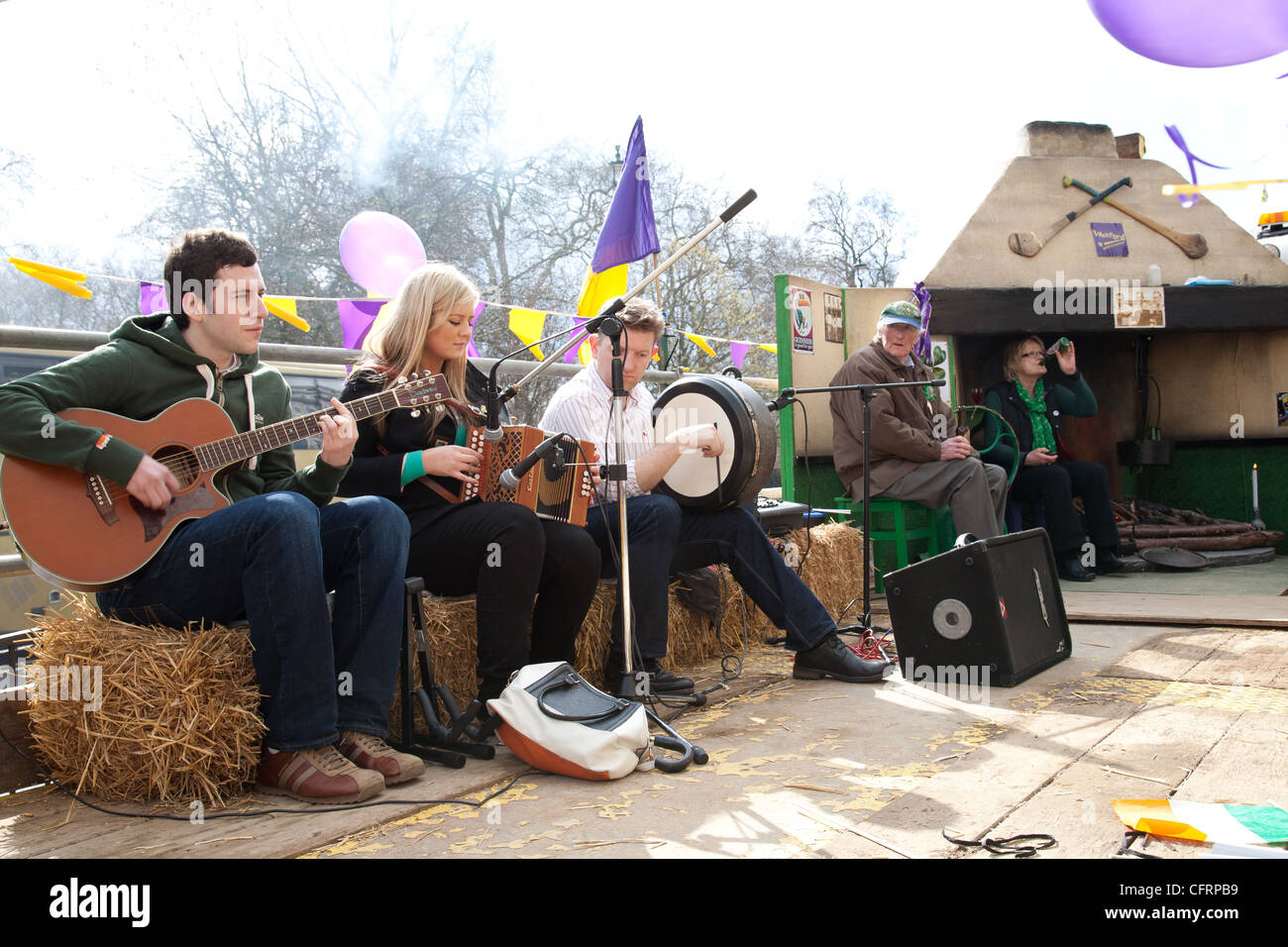 Irish folk band playing on the back of a lorry during The St Patrick's ...