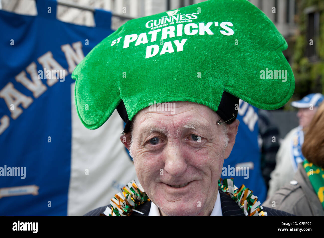 Older man wearing a traditional Irish Hat & St Patrick's day tie St ...