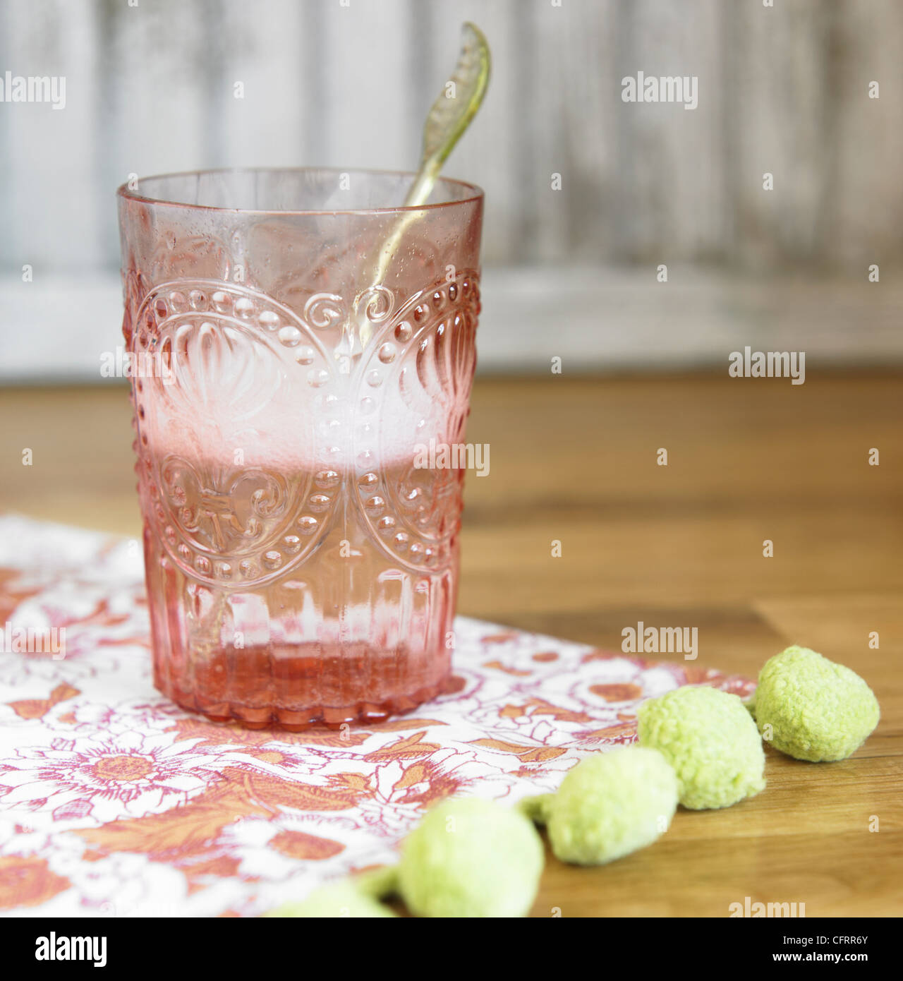 Glass of seltzer with stirrer Stock Photo - Alamy