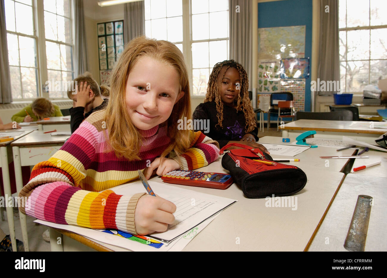 Girl, Grade 3, working at her Desk Stock Photo - Alamy