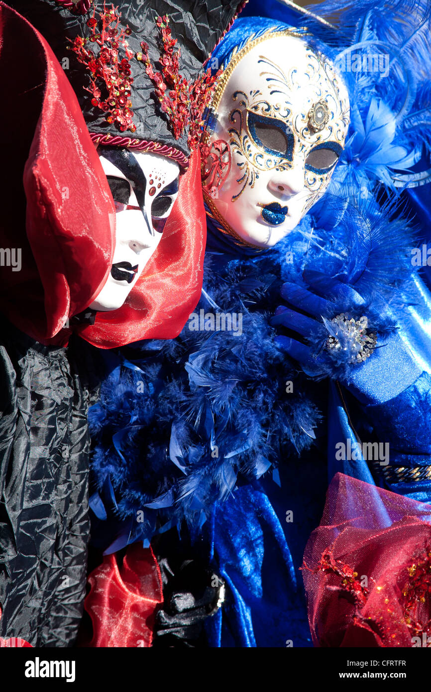 People dressed up in blue and red carnival costume for the Carnival of ...