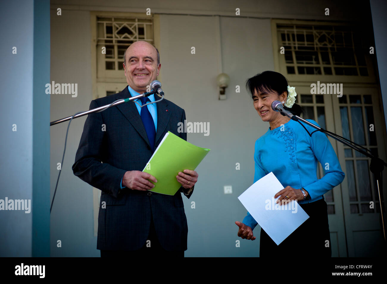 Aung San Suu Kyi with French Foreign Minister, Alain Juppe, at a press ...