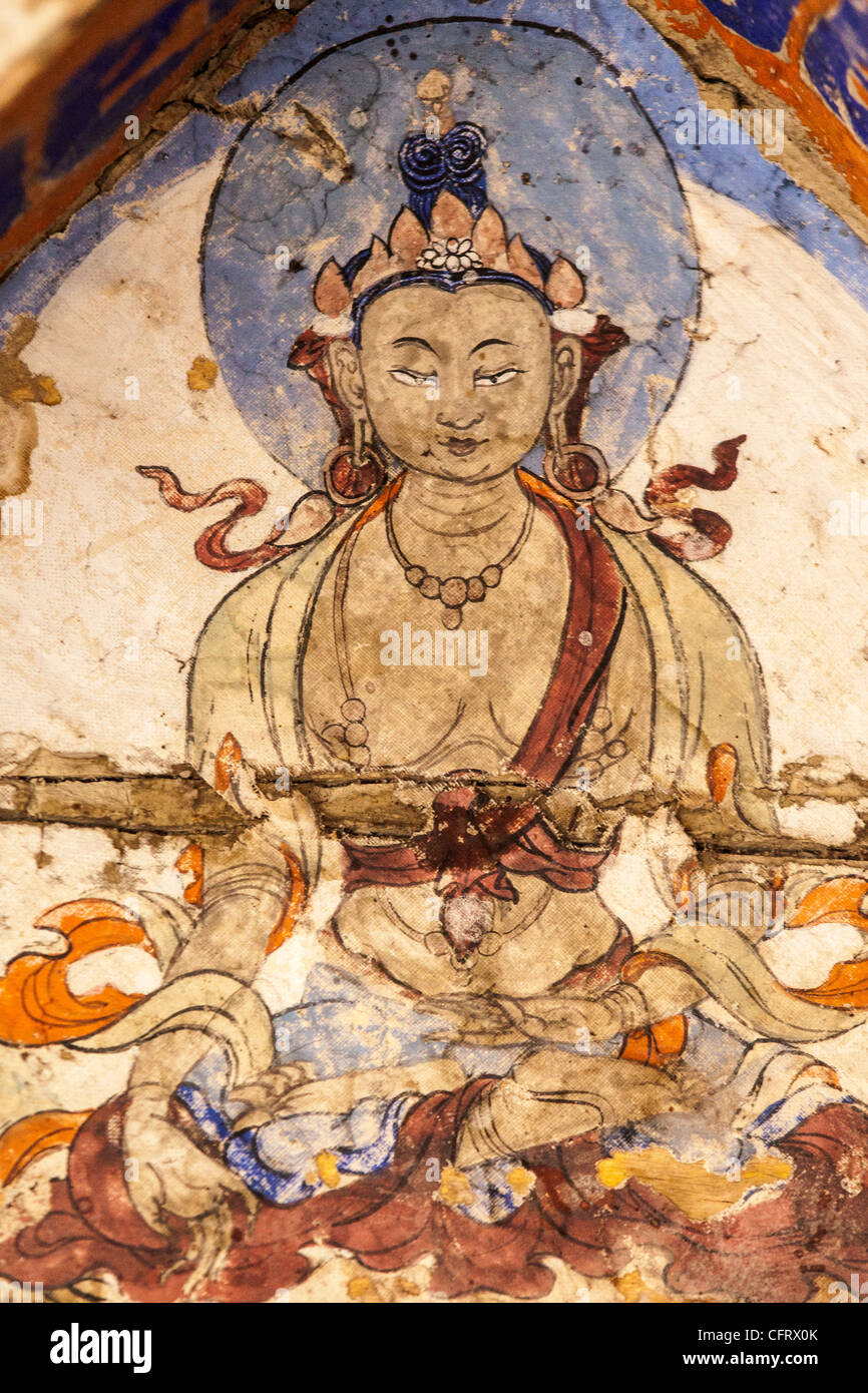 Aged Buddhist murals adorning the walls of a small temple at the Stok ...