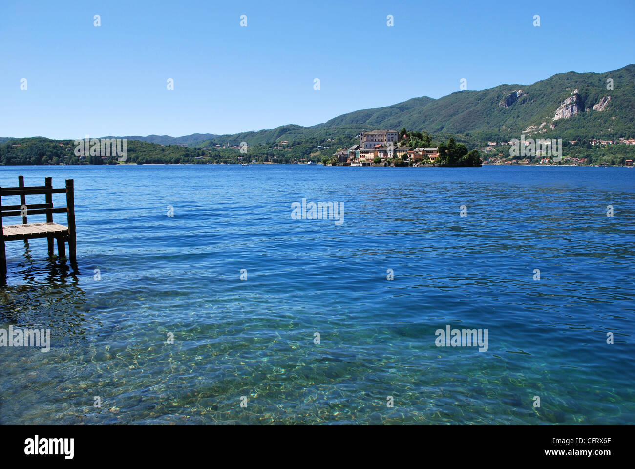 Orta lake with Orta San Giulio island in a sunny day in summer ...