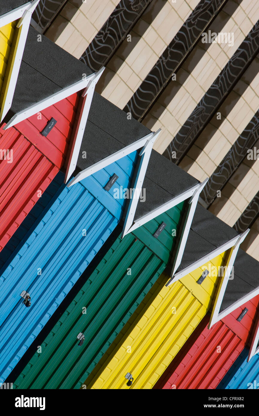 Brightly coloured beach huts along the sea front in Boscombe near ...