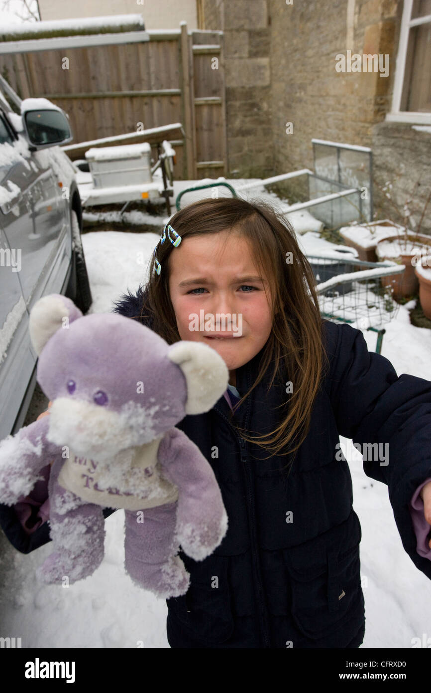 Little girl crying in snow hi-res stock photography and images - Alamy