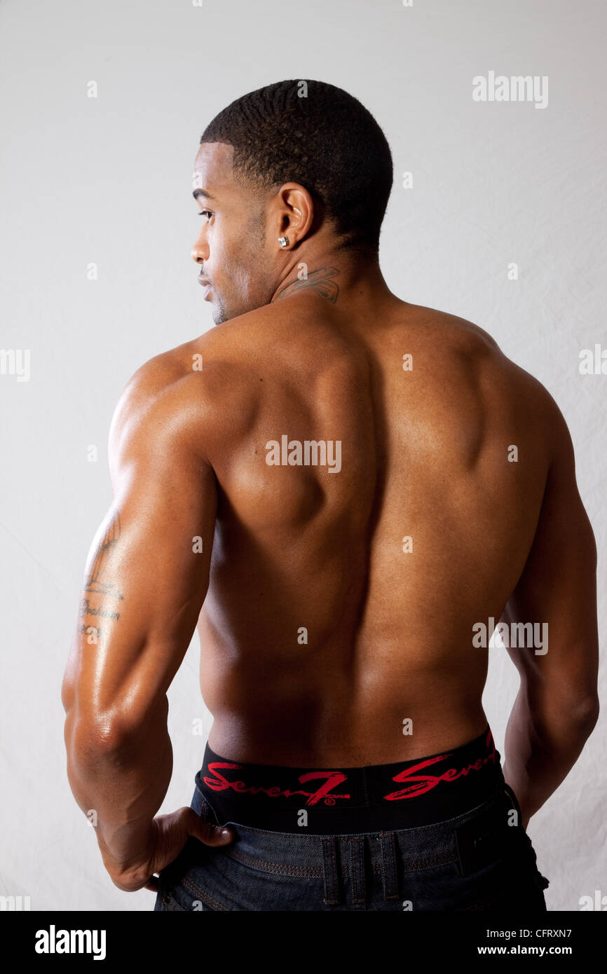 Muscular back of an African American man Stock Photo - Alamy