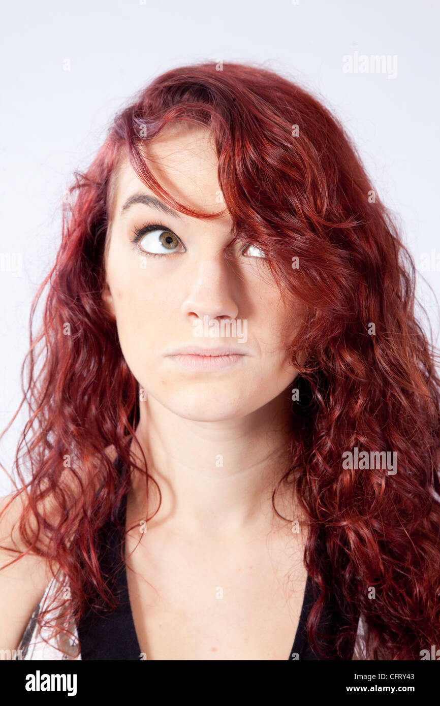 Lovely Caucasian Redhead woman smiling with a pleasing smile, and ...