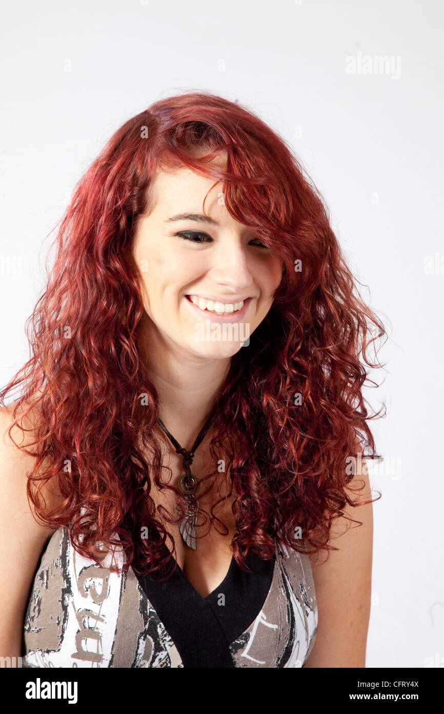 Lovely Caucasian Redhead woman smiling with a pleasing smile, and ...