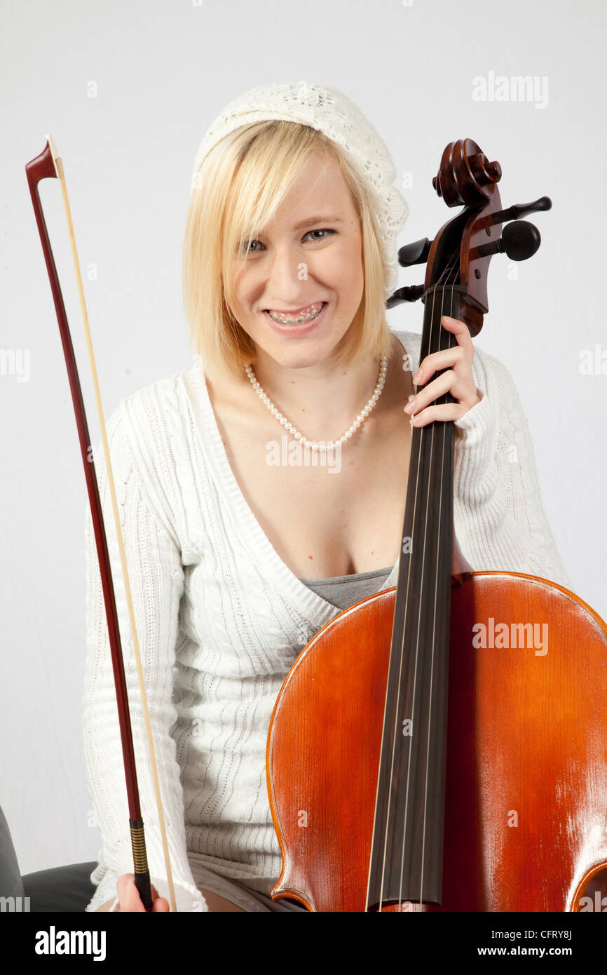Holding a bow cello hi-res stock photography and images - Alamy