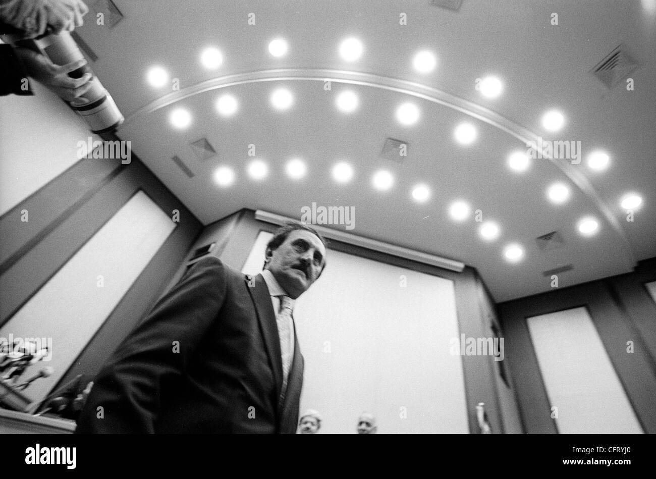 A Kurdish parliamentarian leaves the podium after being sworn in to the ...