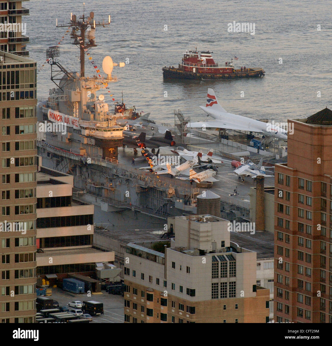 The USS Intrepid is moved from its berth on Manhattan's West Side to ...