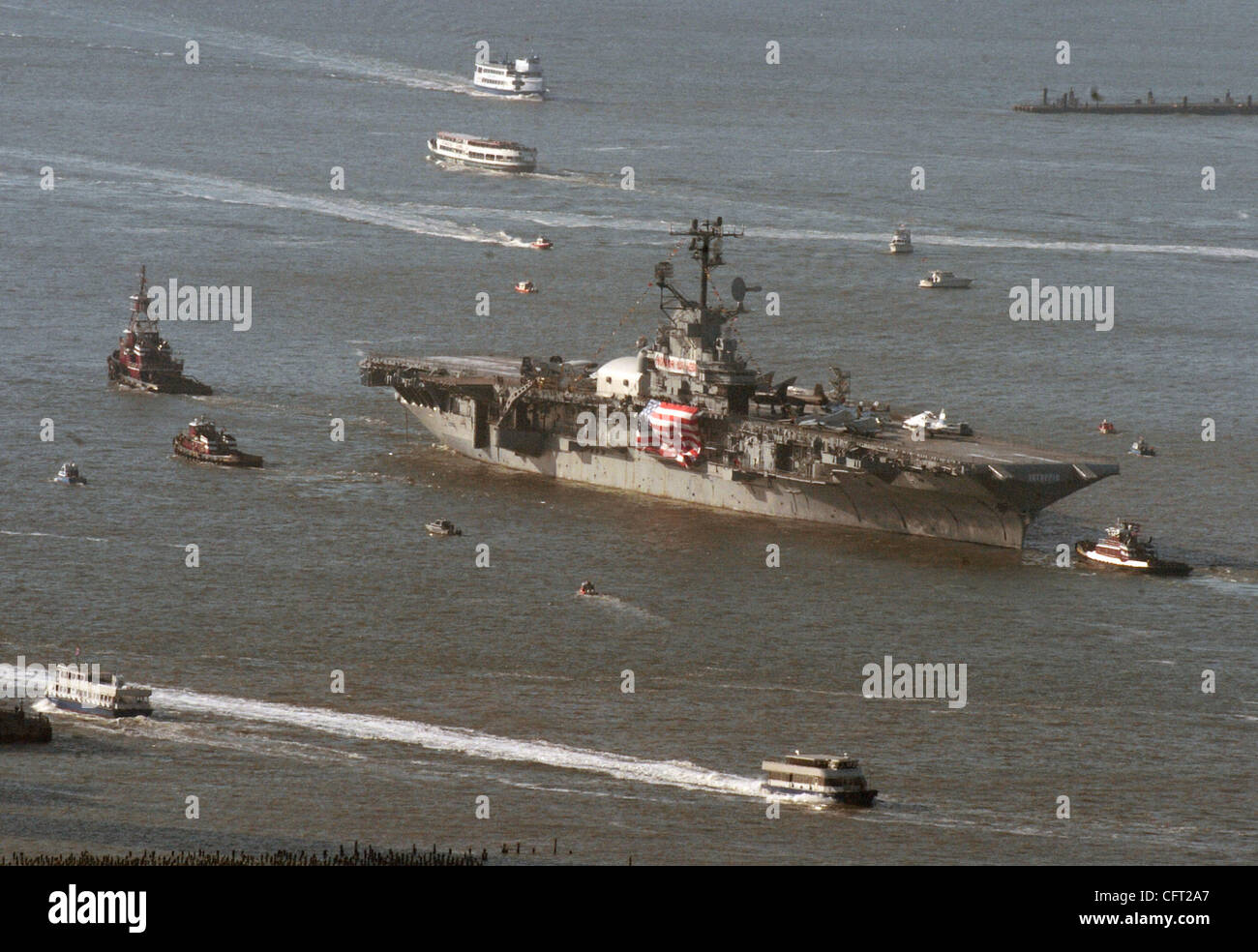 The USS Intrepid is moved from its berth on Manhattan's West Side to ...