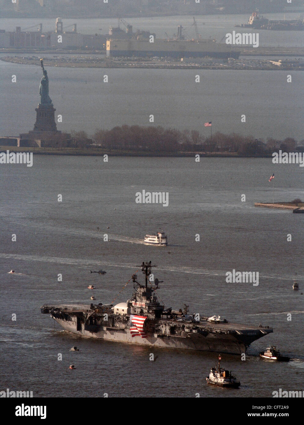 The USS Intrepid is moved from its berth on Manhattan's West Side to ...