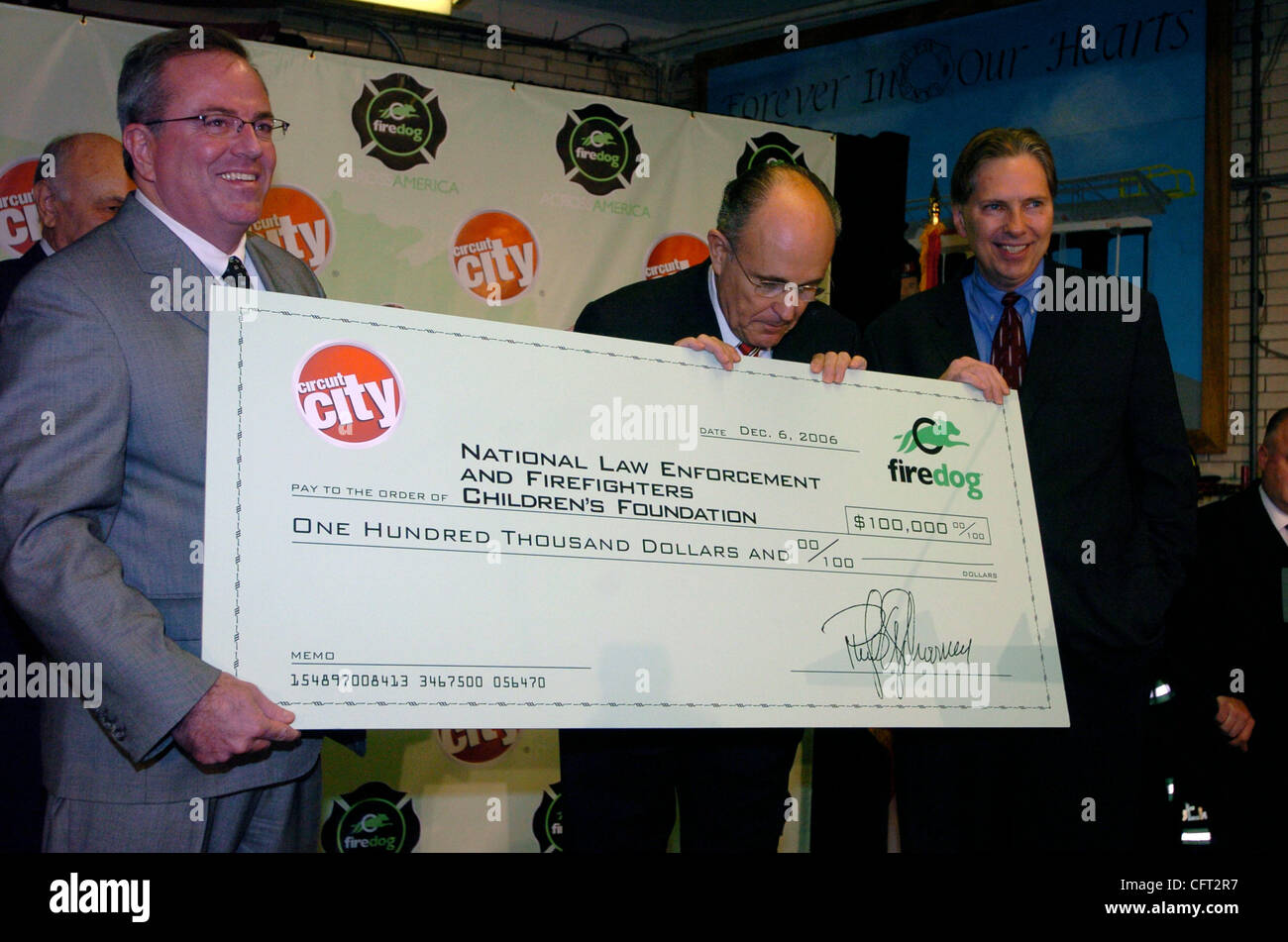 Former New York City Mayor Rudolph Giuliani (C) with Philip J ...